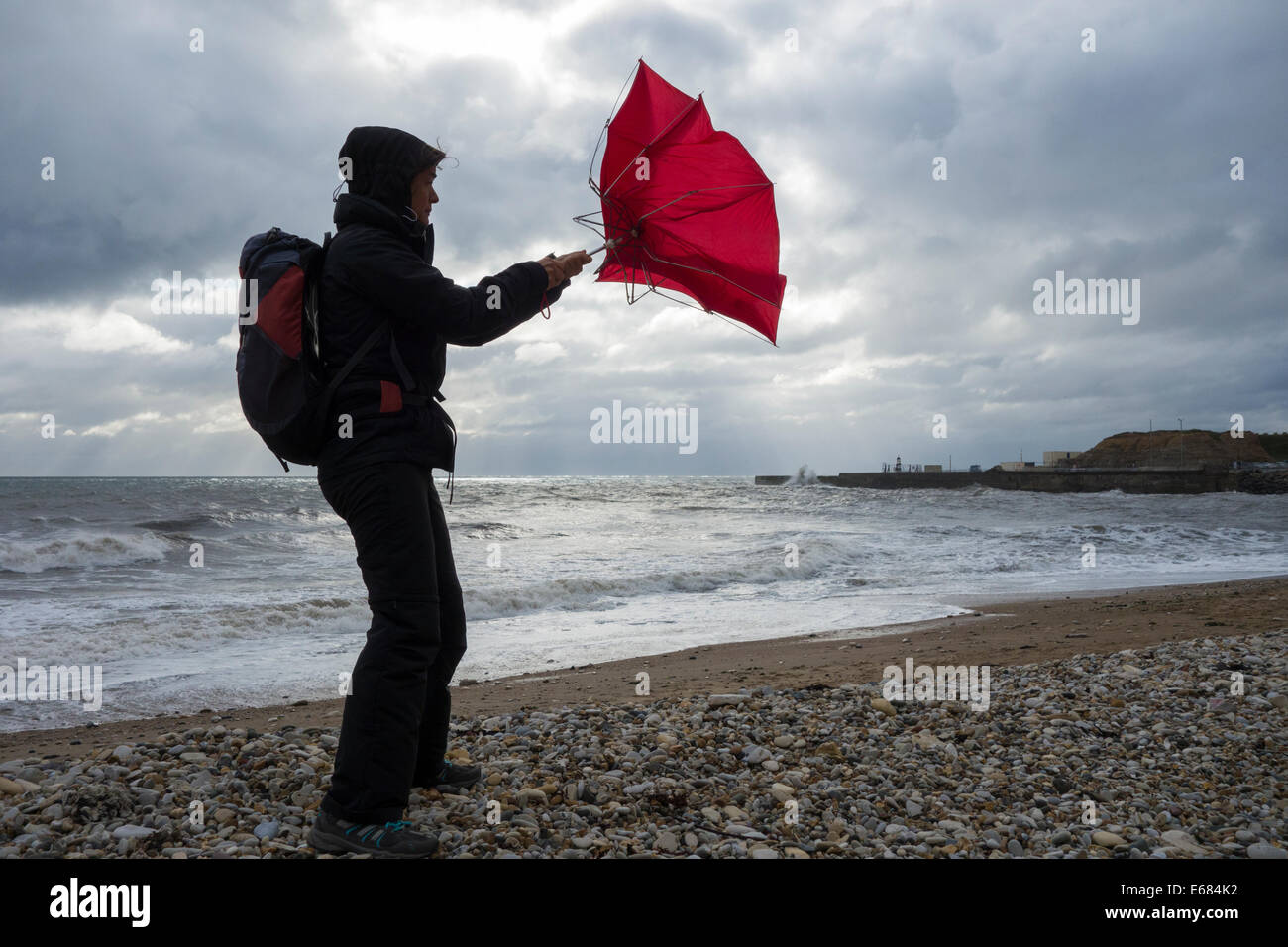 Female walker on the Durham Heritage coastal footpath at Seaham on a ...