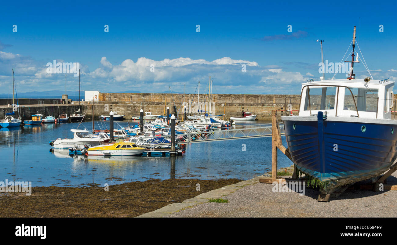HOPEMAN HARBOUR MORAY COAST SCOTLAND WITH BLUE BOAT Stock Photo - Alamy