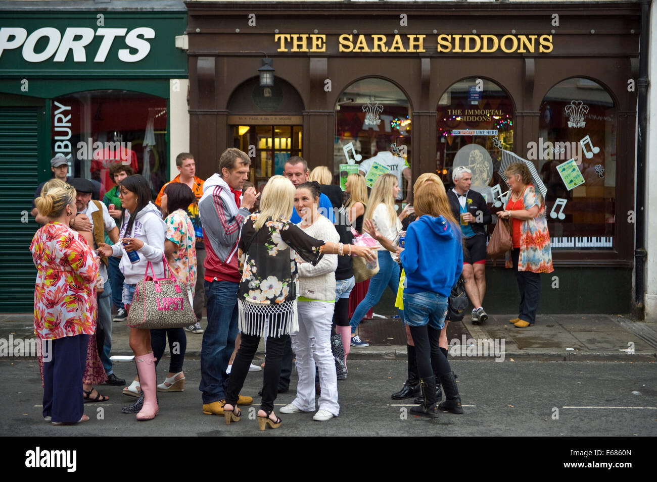 People on the street outside The Sarah Siddons pub during Brecon Jazz ...
