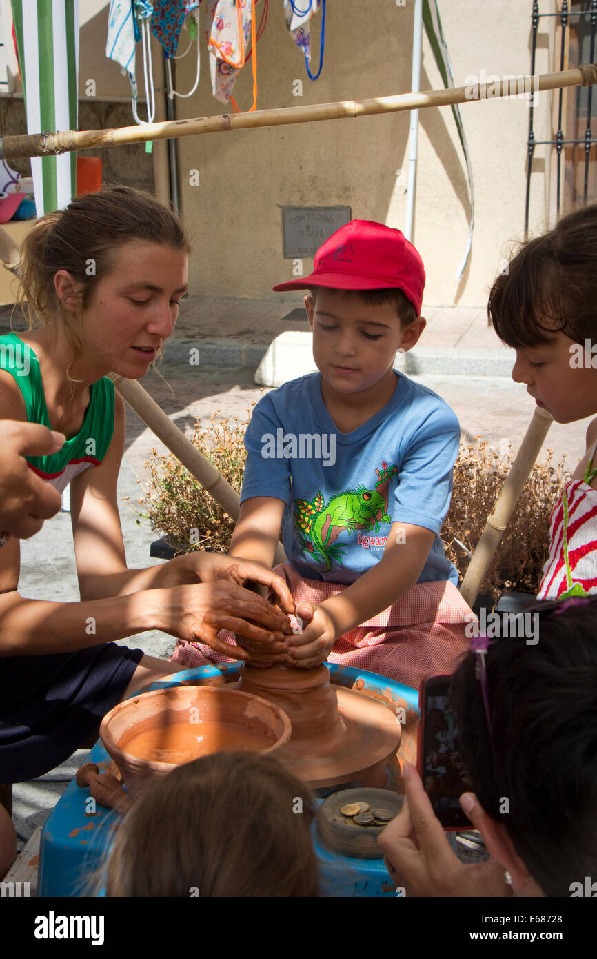 Children learning how to make clay pots Stock Photo - Alamy