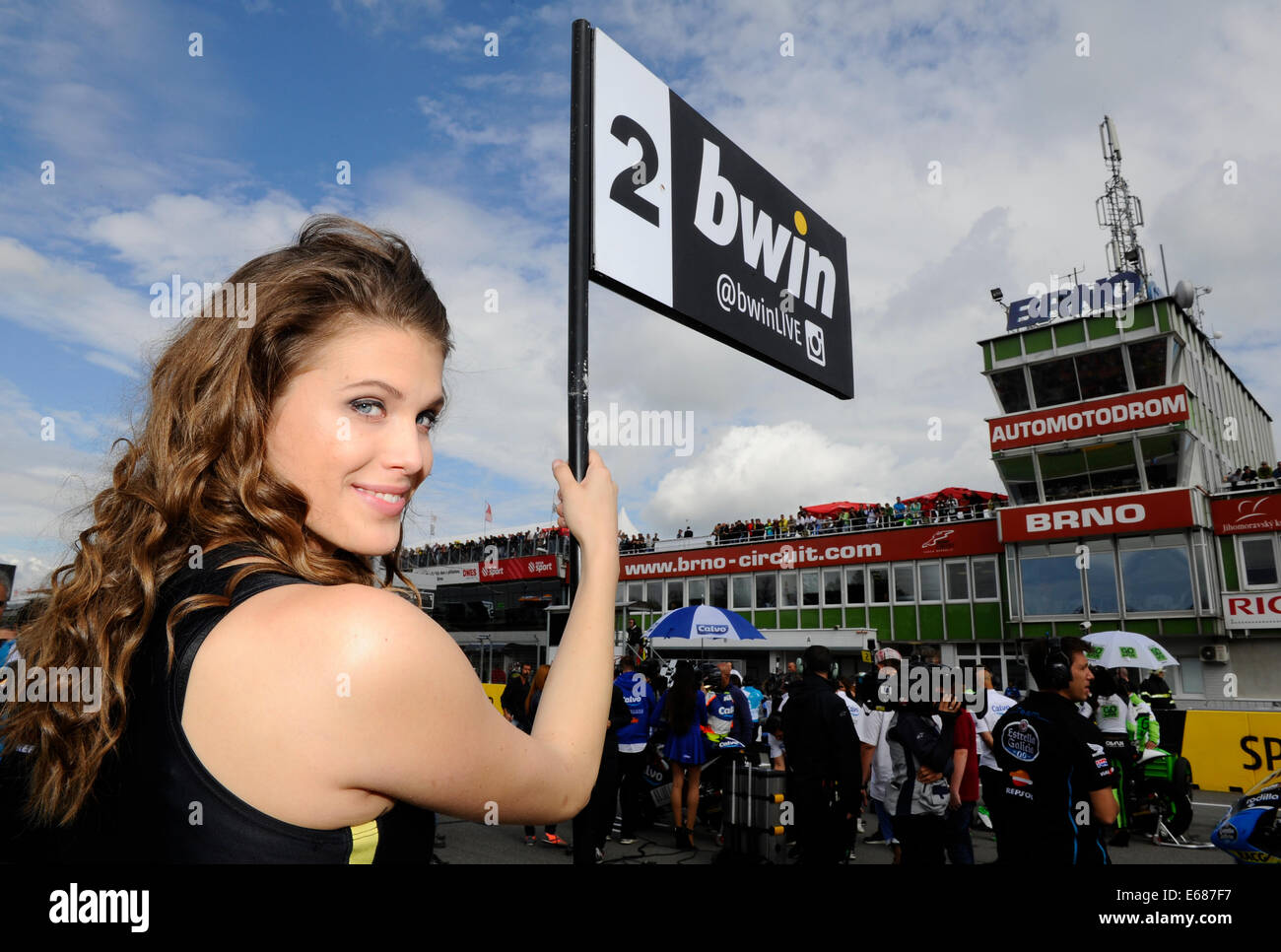 The hostess is pose before start of motorcycle Grand Prix Moto 3 race ...