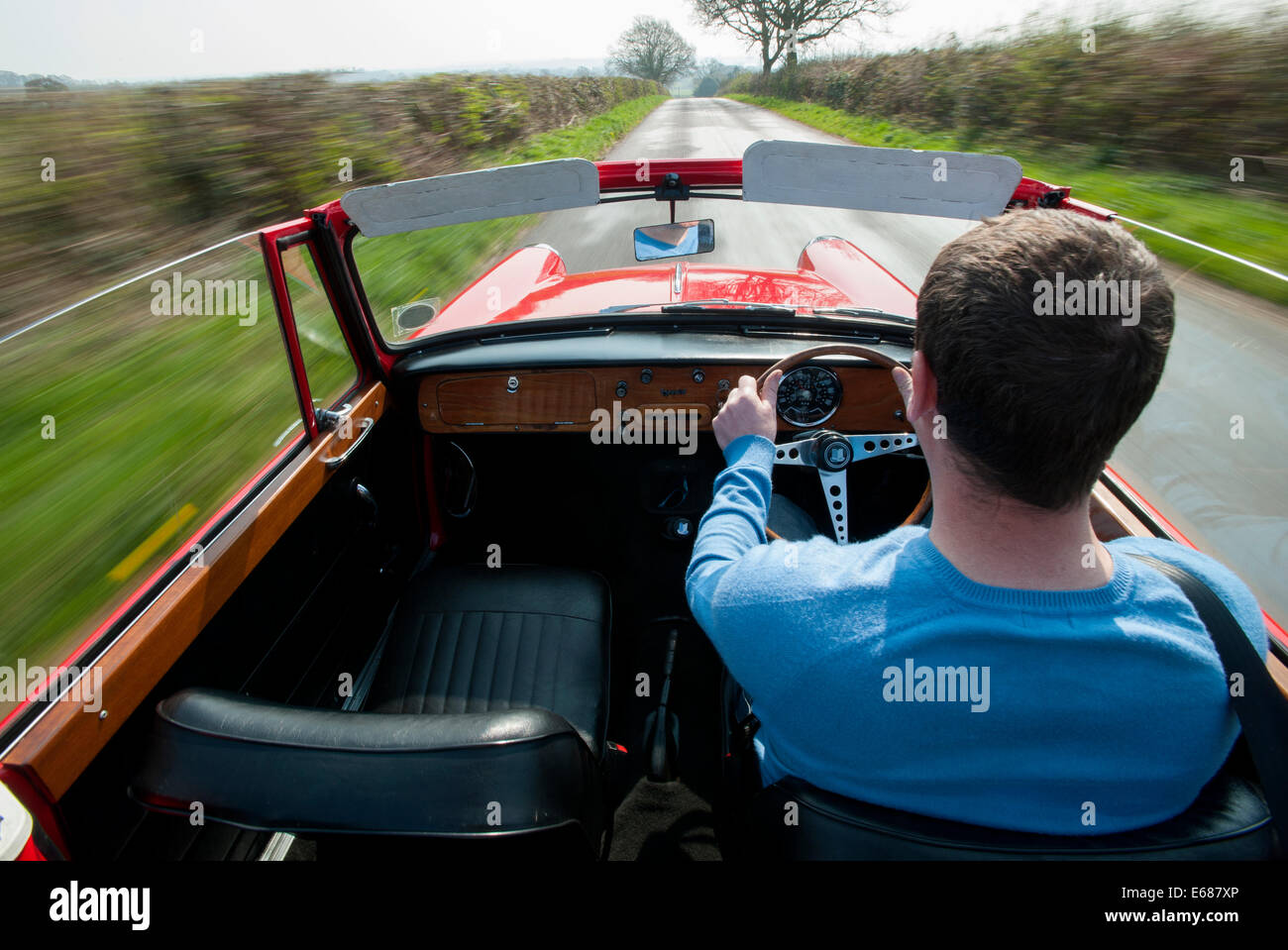Man driving classic convertible by hi-res stock photography and images ...