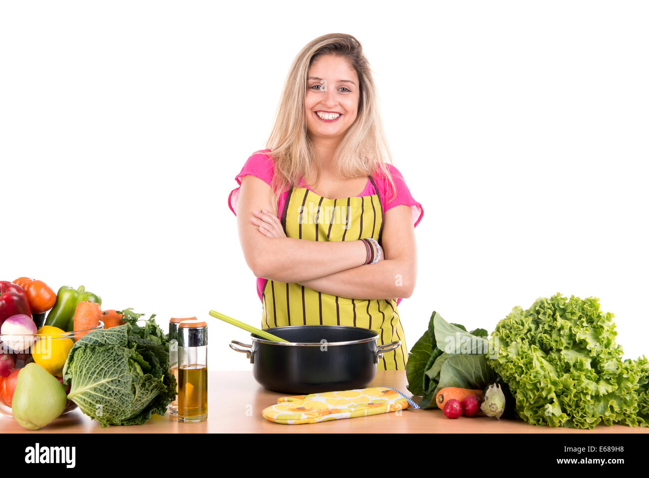 Beautiful woman cooking isolated in white Stock Photo - Alamy