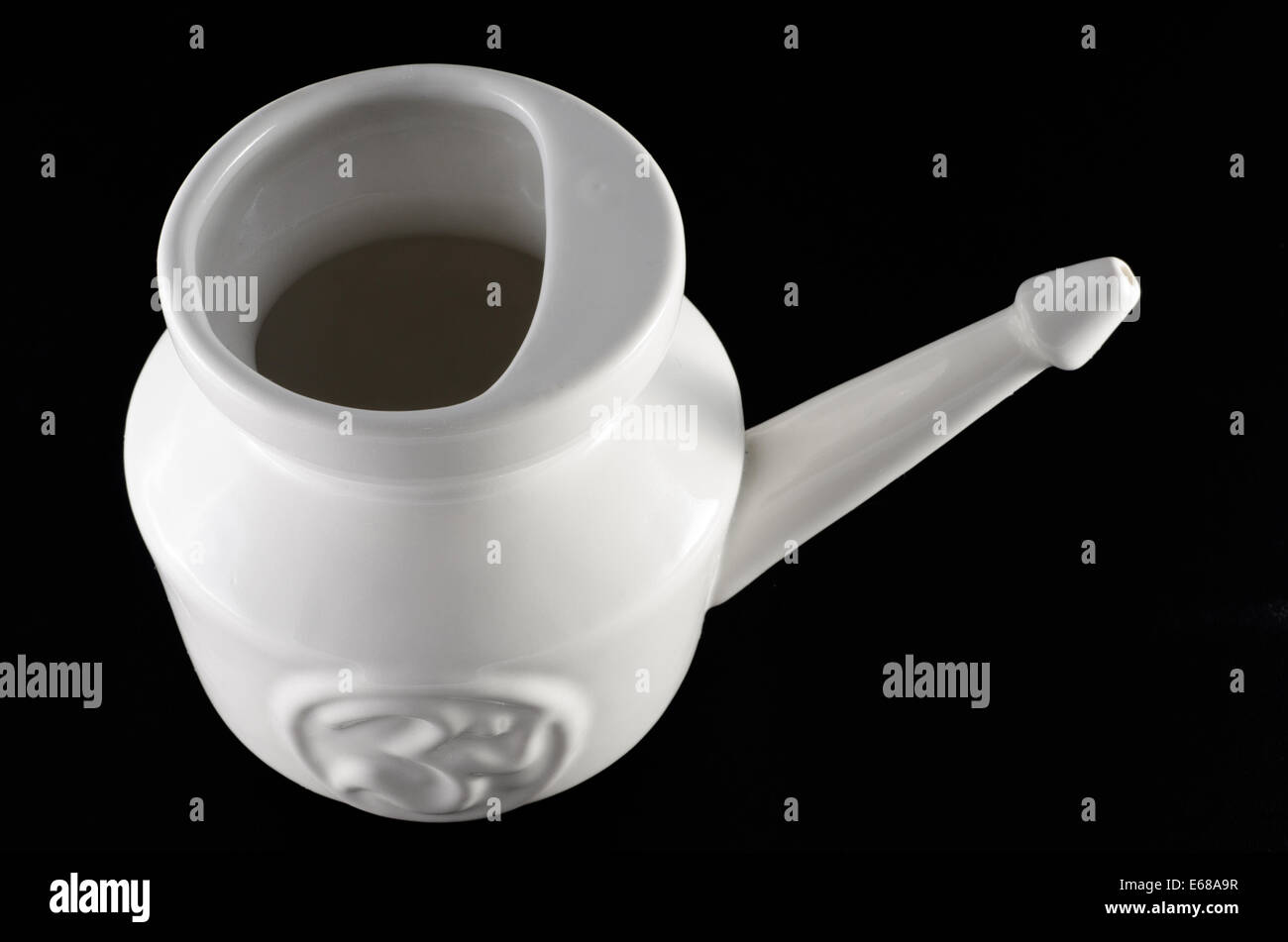Neti Lota vessell made of white ceramic Stock Photo - Alamy