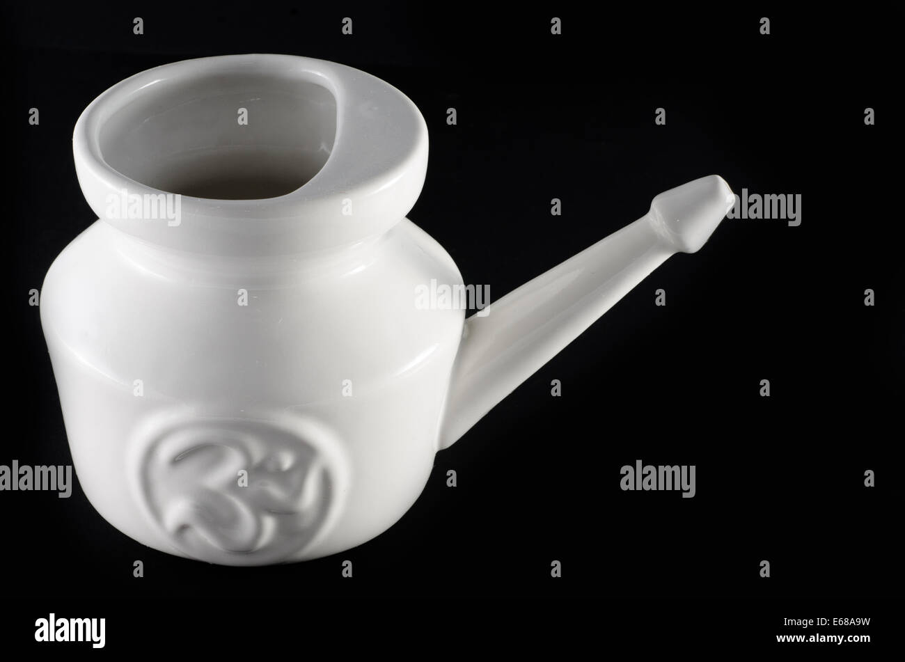 Neti Lota vessell made of white ceramic Stock Photo - Alamy