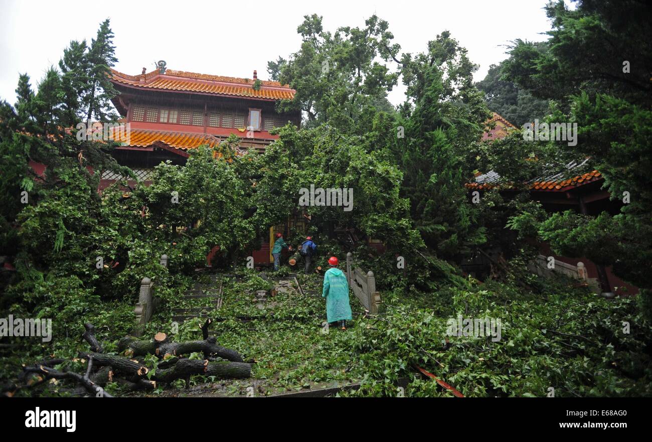 Changsha, China's Hunan Province. 18th Aug, 2014. Workers clear a ...