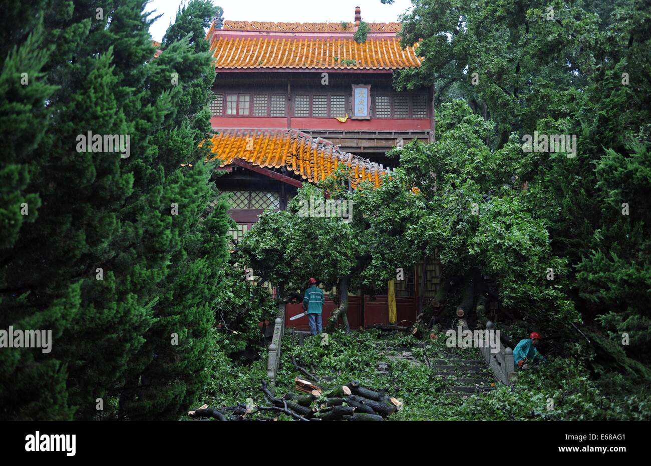 Changsha, China's Hunan Province. 18th Aug, 2014. Workers clear a ...