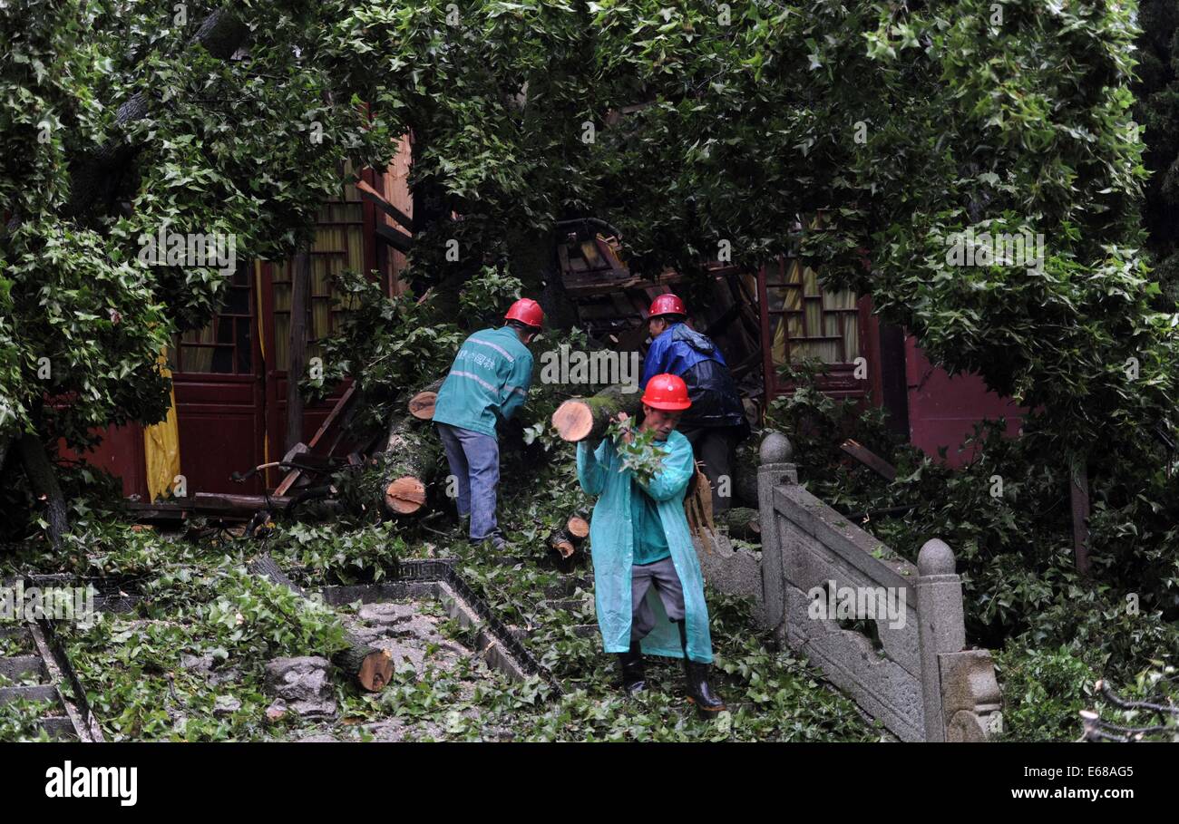 Changsha, China's Hunan Province. 18th Aug, 2014. Workers clear a ...