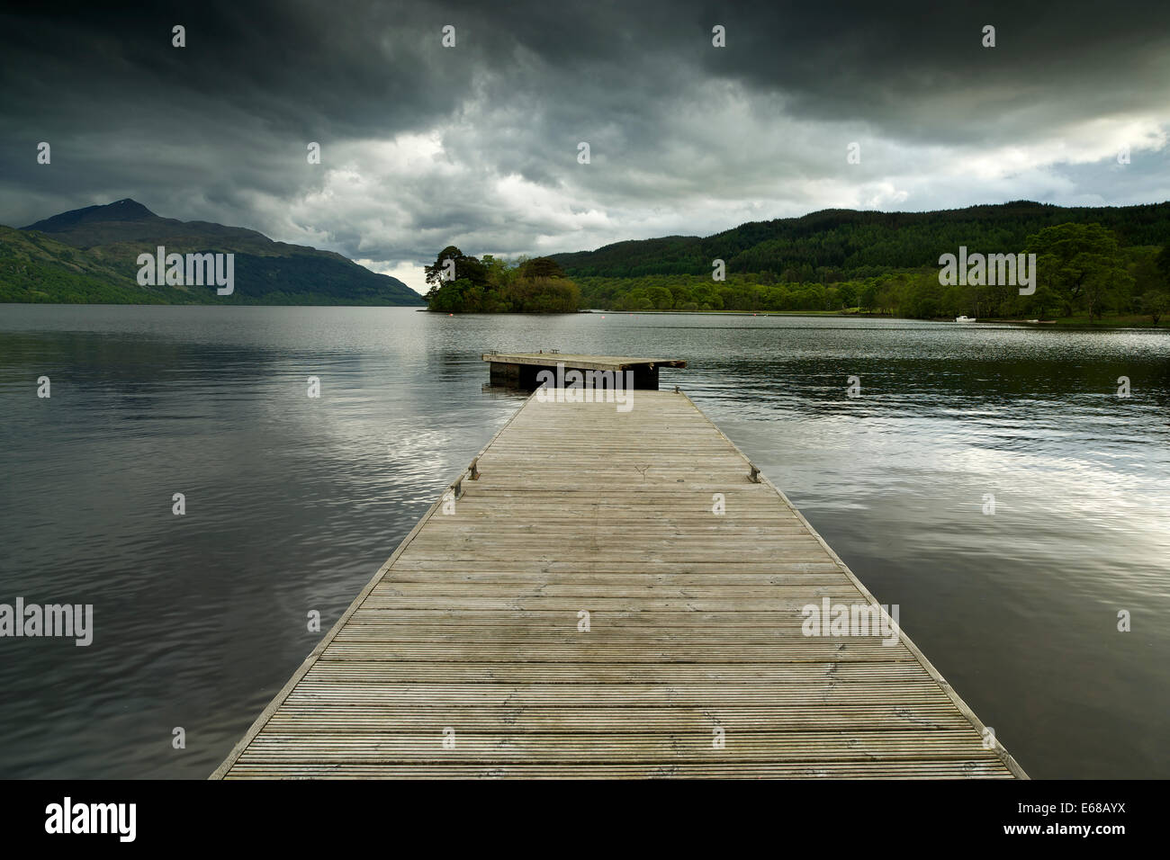 Dark clouds loom above loch Lomond Stock Photo - Alamy