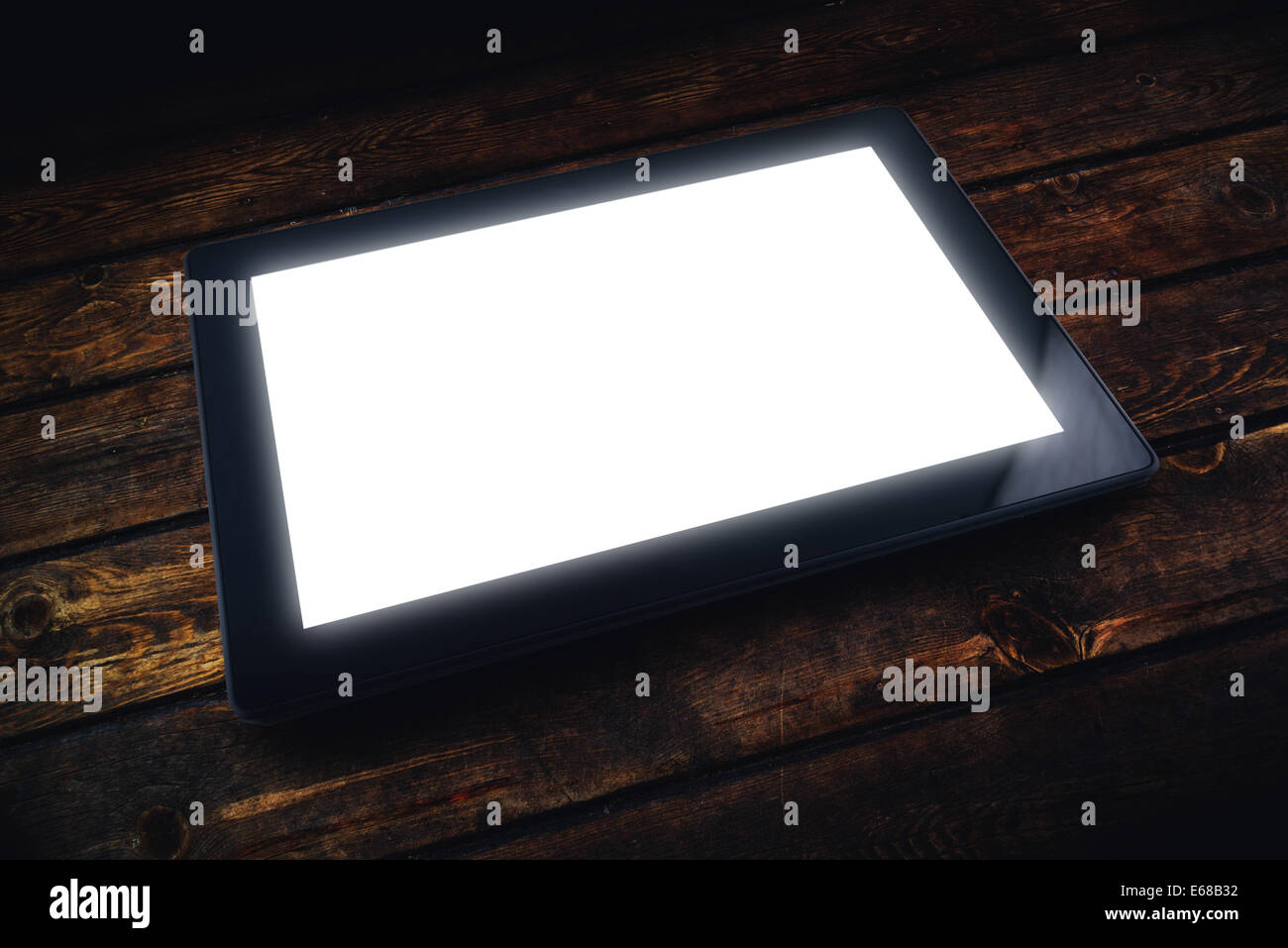 Generic model of Tablet PC on table. 10 inch display tablet computer as ...