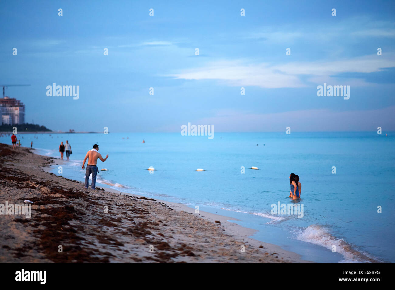 Miami in Florida USA tourist taking holiday snapshot pictures on South ...