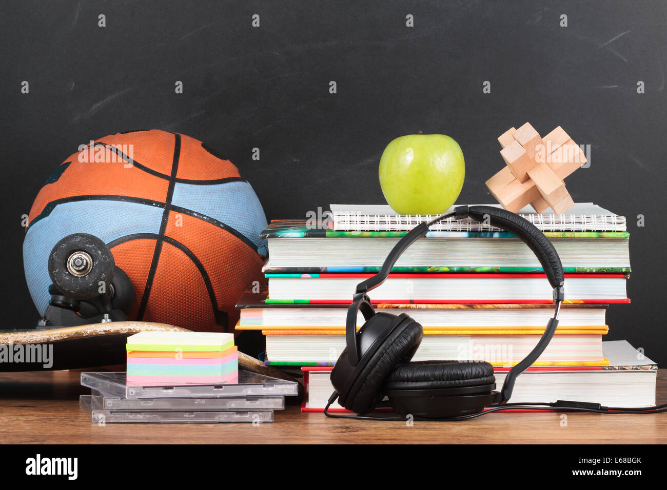 School accessories on desktop with blackboard in the background Stock ...