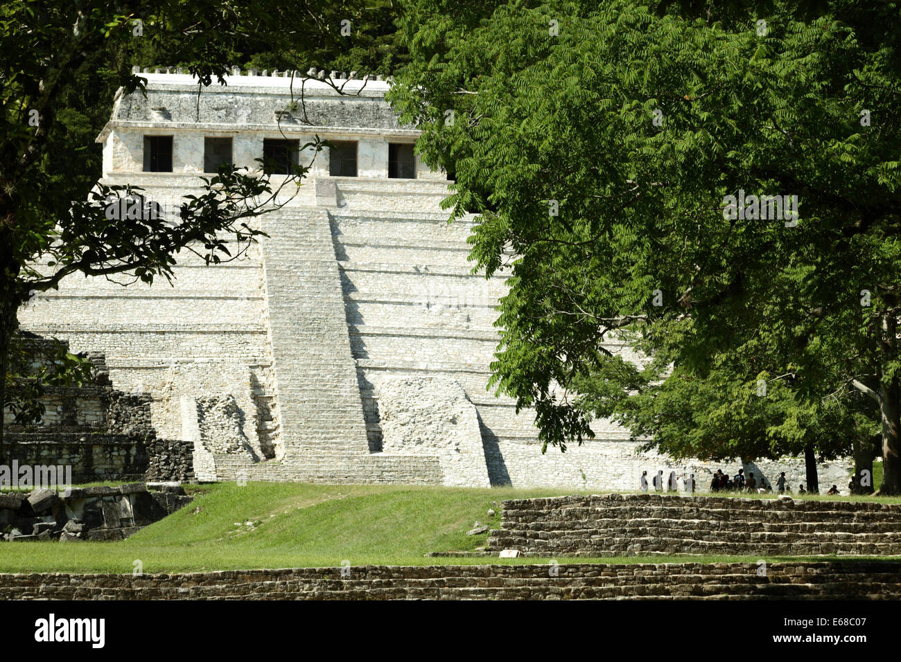 Temple of the Inscriptions towers over visitors at the Mayan ruins of ...