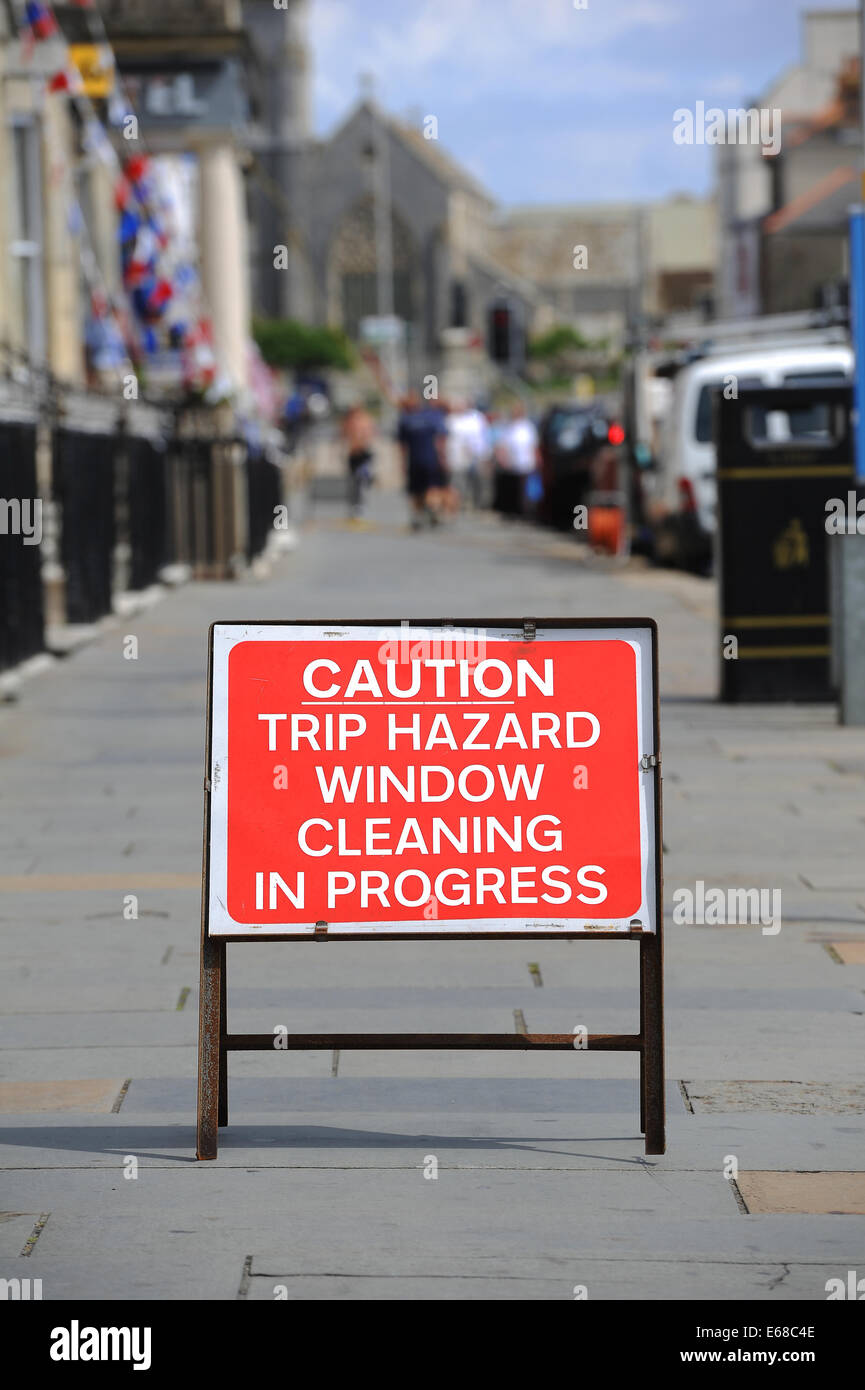 Warning sign of trip hazard while window cleaning in progress, UK Stock ...