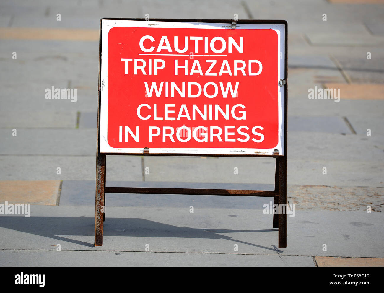 Warning sign of trip hazard while window cleaning in progress, UK Stock ...