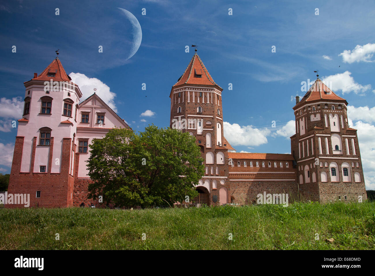 beautiful red brick castle stands in Europe Stock Photo - Alamy