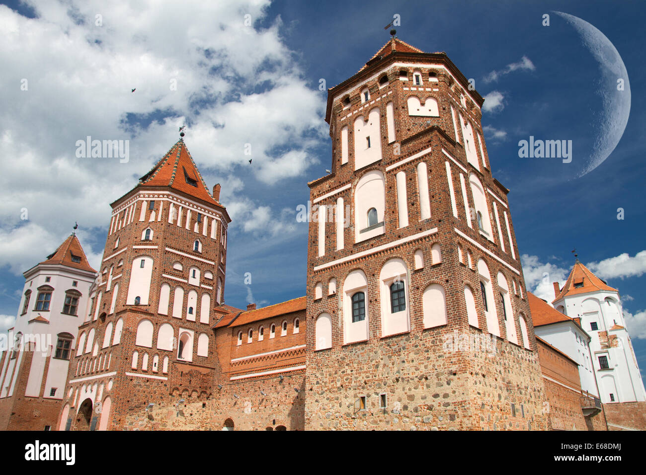 beautiful red brick castle stands in Europe Stock Photo - Alamy