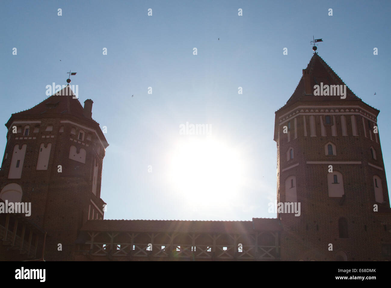 beautiful red brick castle stands in Europe Stock Photo - Alamy