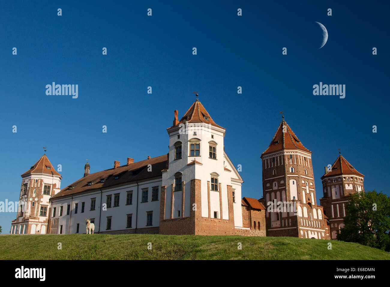 beautiful red brick castle stands in Europe Stock Photo - Alamy