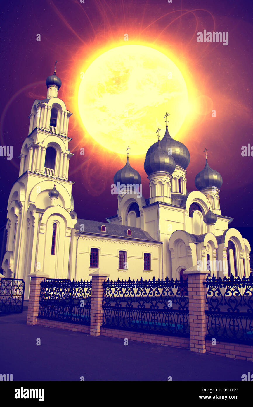 the sun shines over the Catholic church. possible end of the world ...