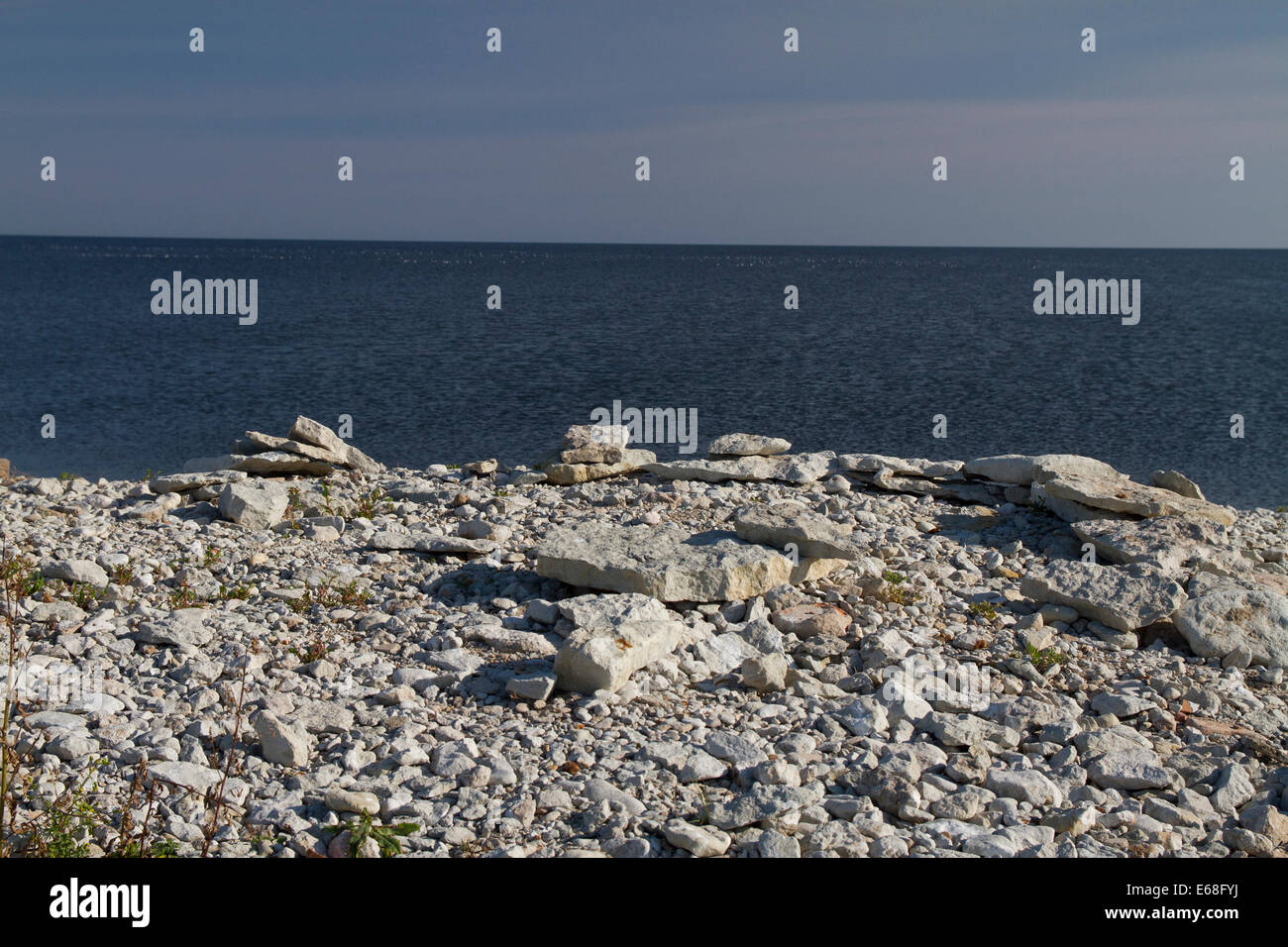 Coast sea and on shore rocks Stock Photo - Alamy