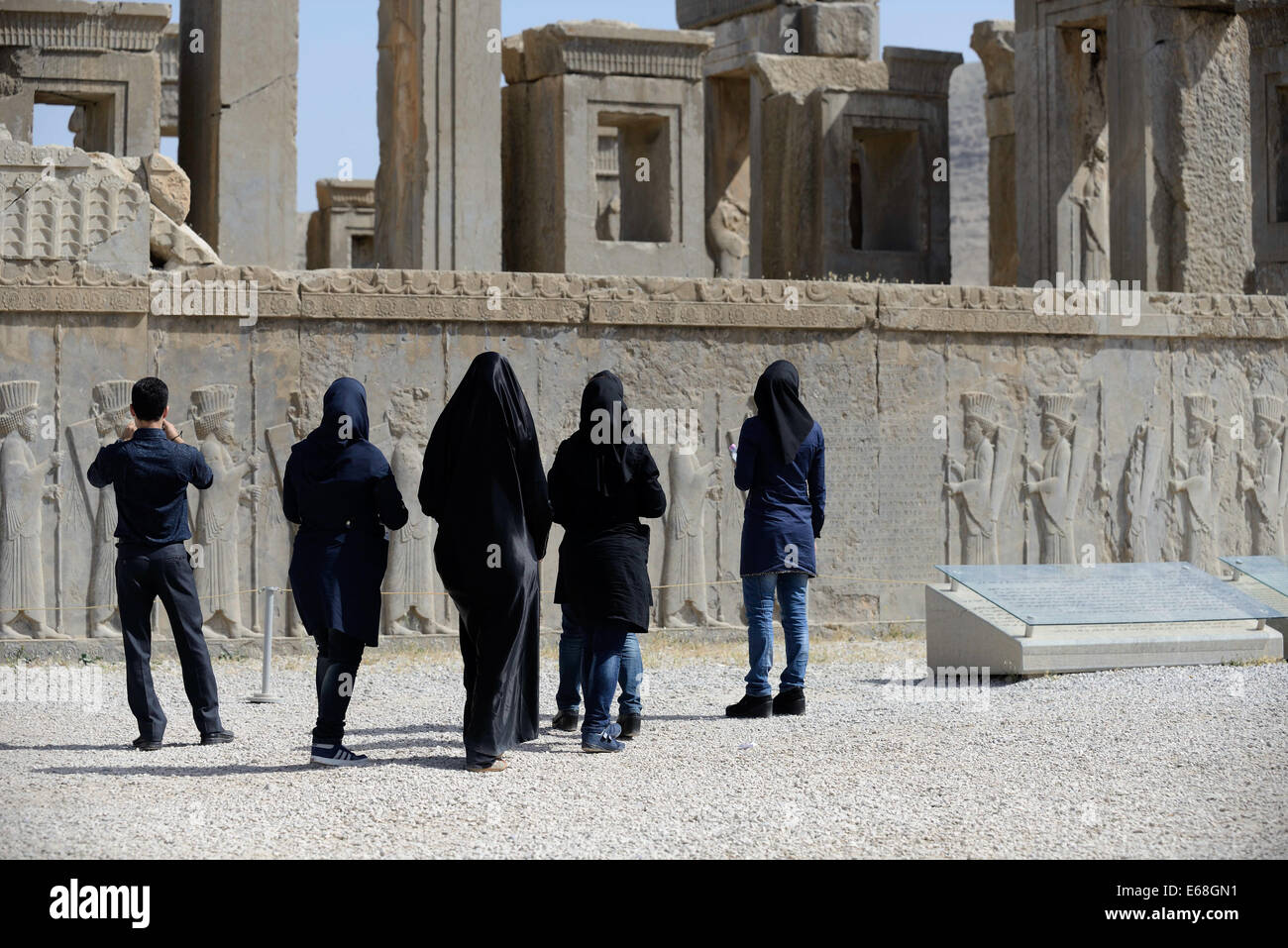 A group of iranian Tourists are visiting ancient Persepolis ...