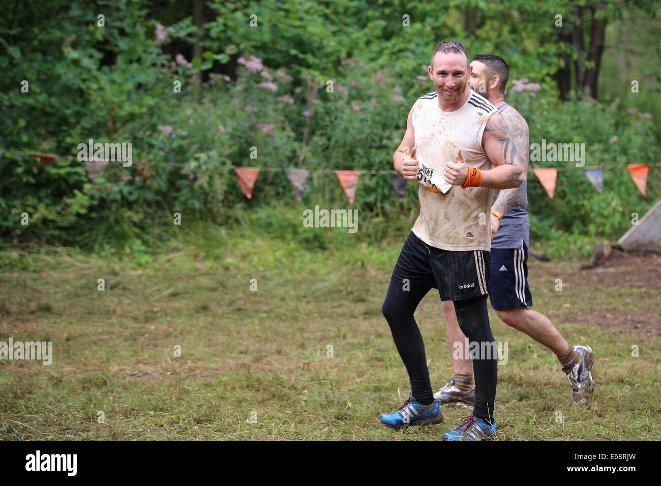 A competitor takes part in Tough Mudder South West UK Stock Photo - Alamy
