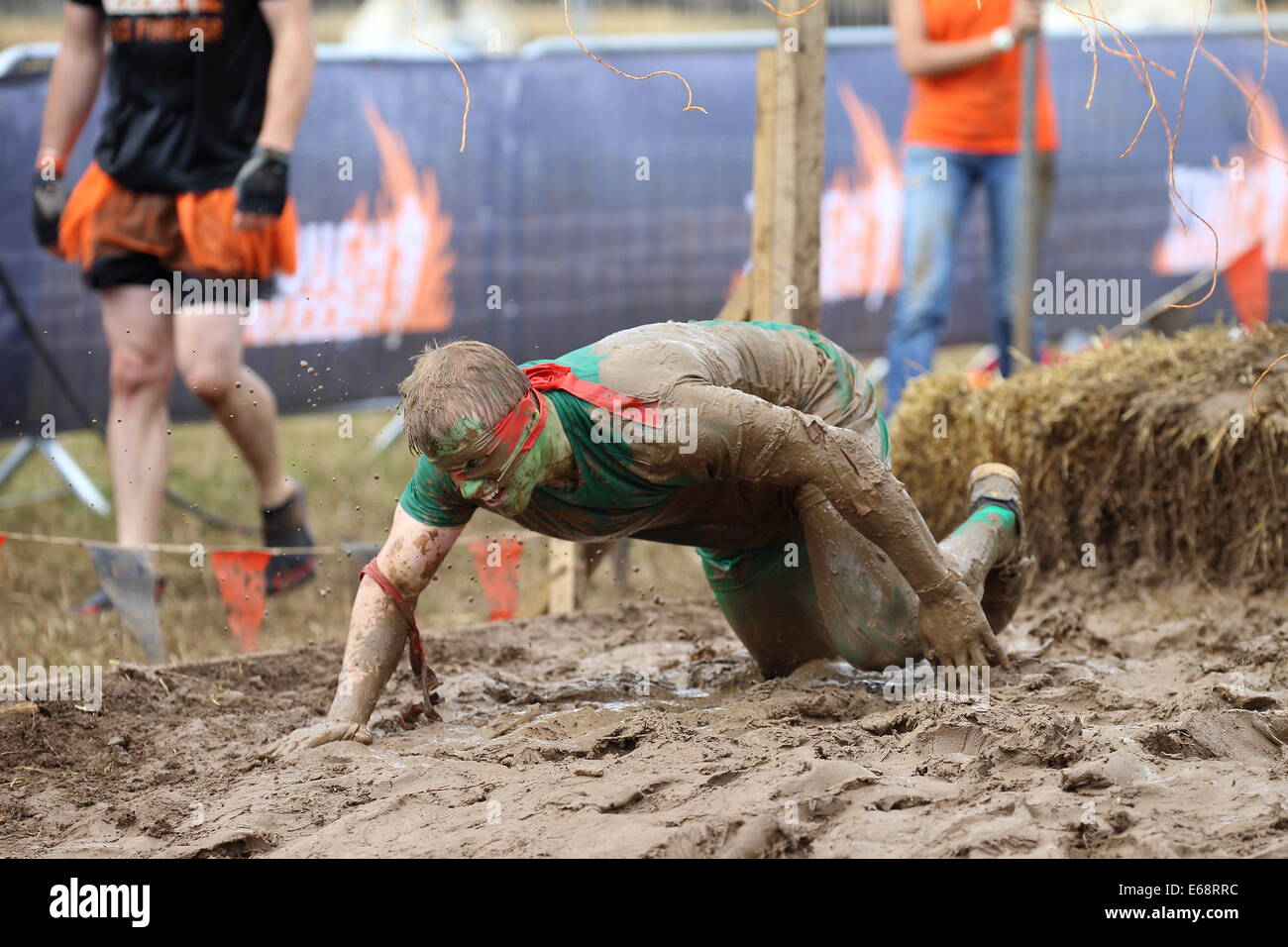 A Tough Mudder tackling the Shock Therapy obstacle Stock Photo - Alamy