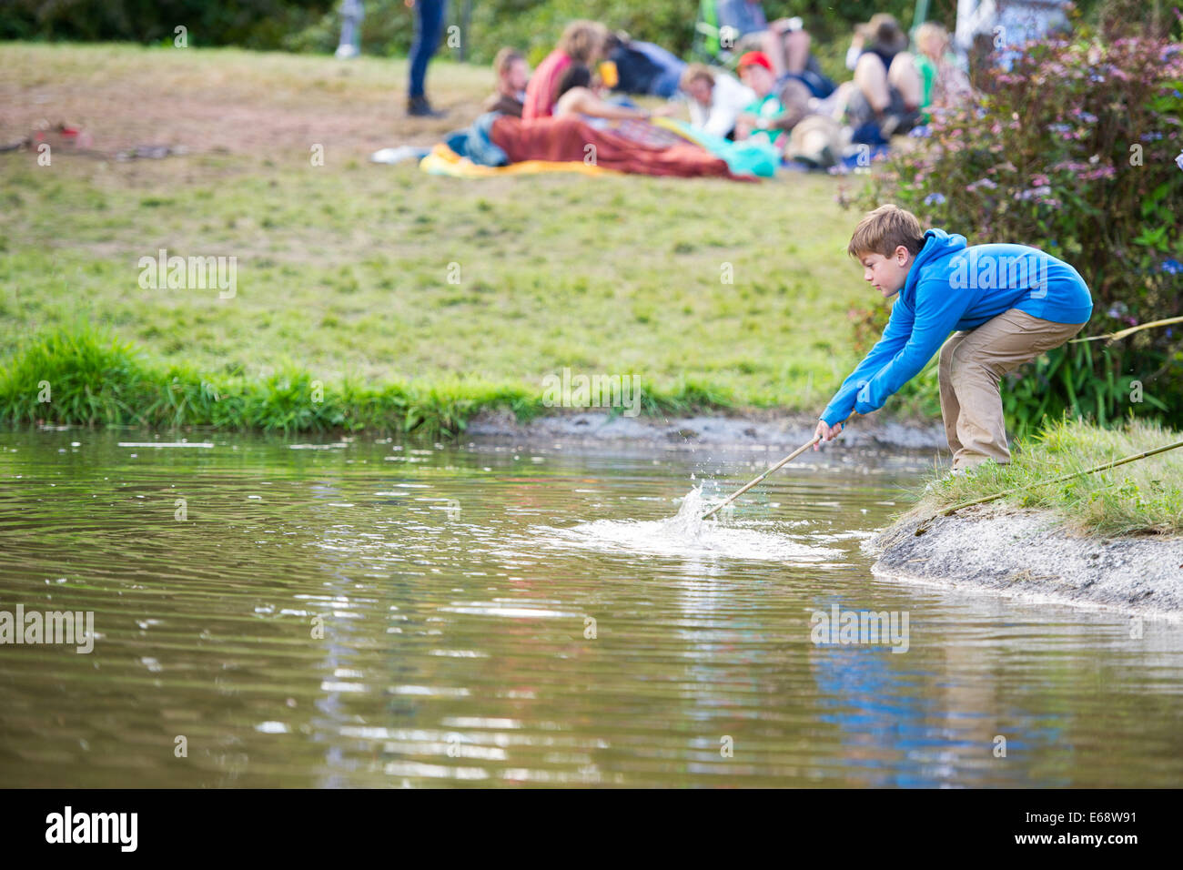 Children playing in pond hi-res stock photography and images - Alamy