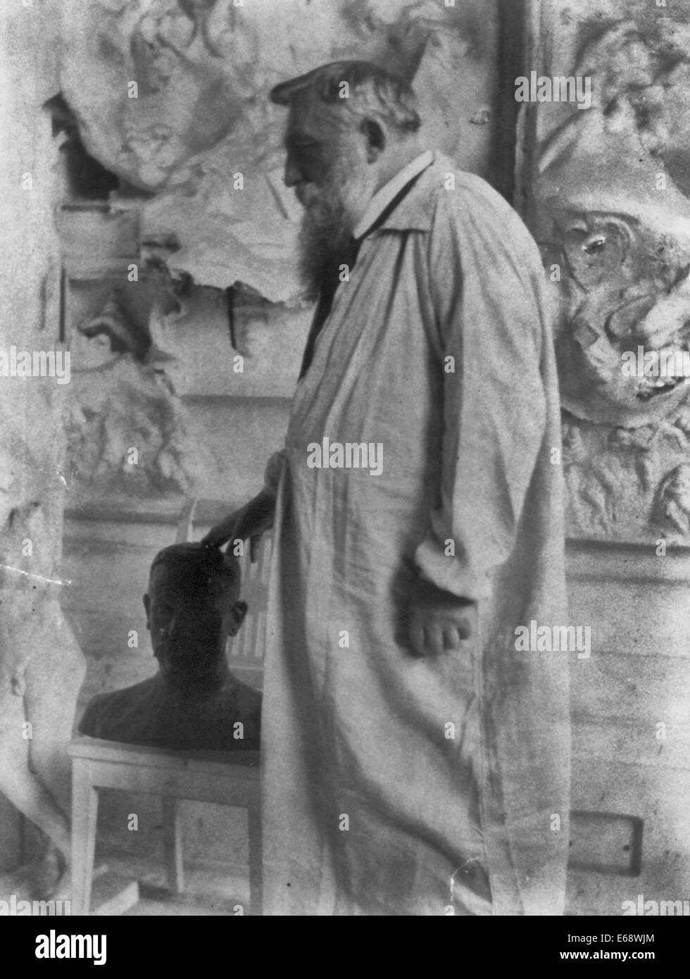 Auguste Rodin, profile, Meudon, France, with hand on sculpture, circa ...