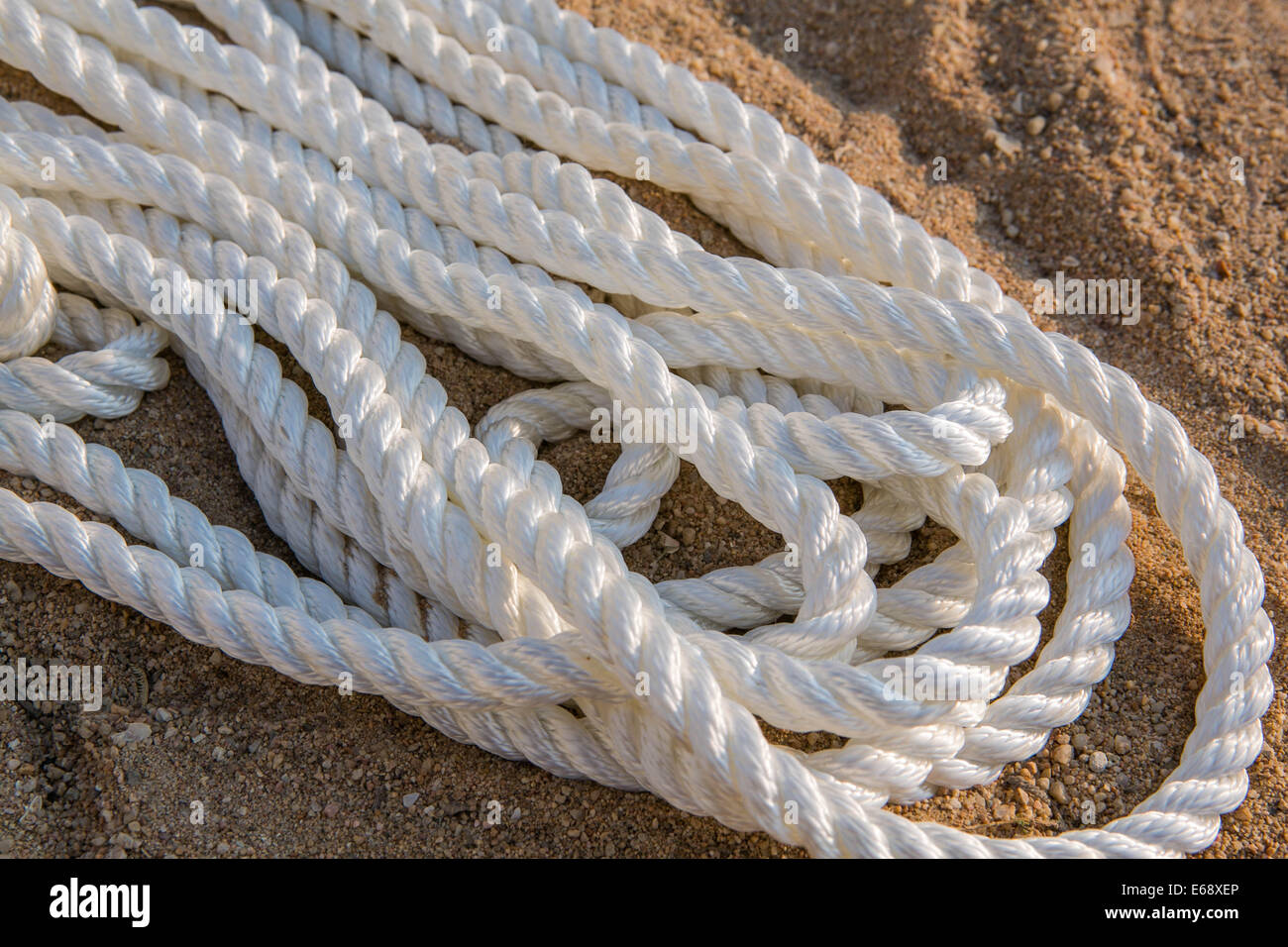 Big marine sea ropes in heap Stock Photo - Alamy