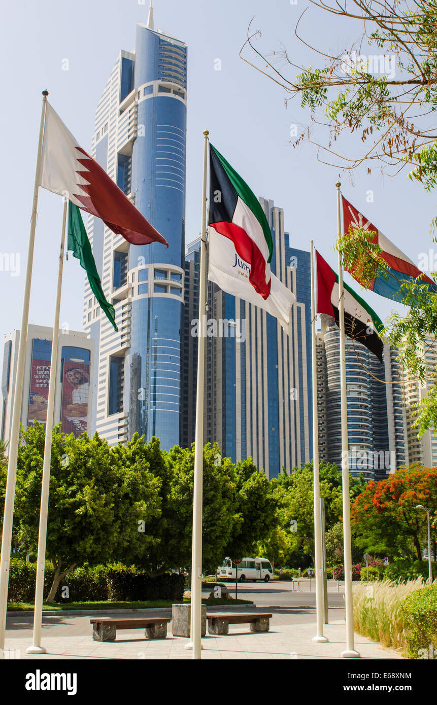 Small park garden flags downtown skyline cityscape buildings of Dubai ...