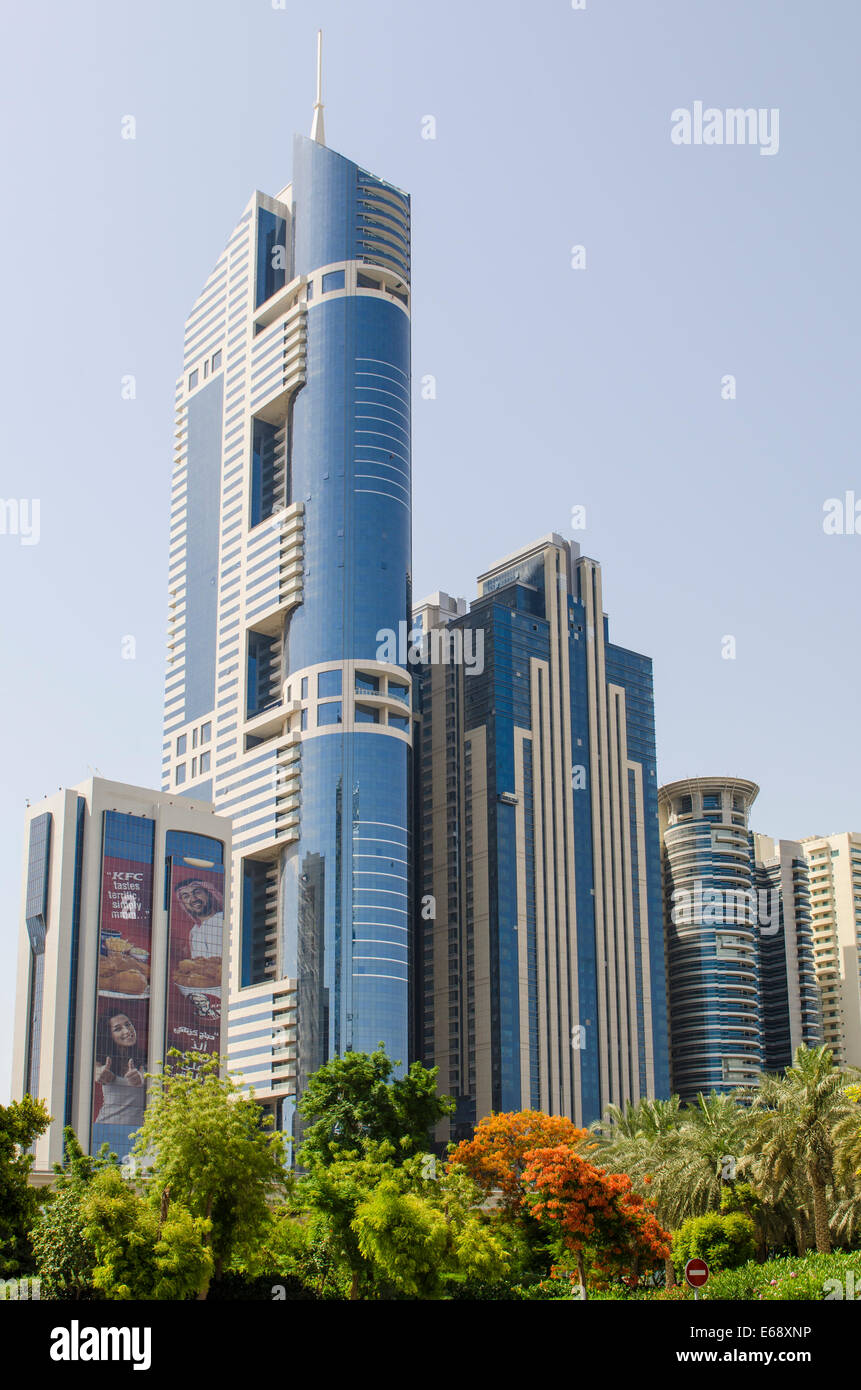 Small park garden palm trees downtown skyline cityscape buildings of ...