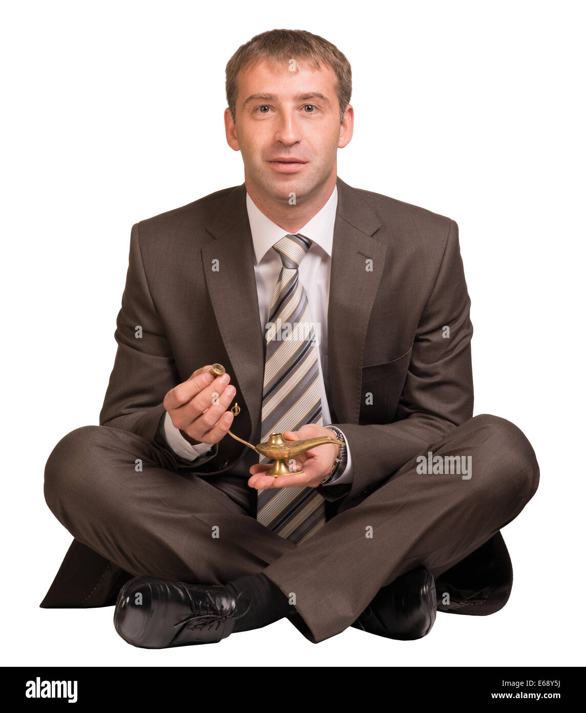 Male person hold golden Cut Out Stock Images & Pictures - Alamy