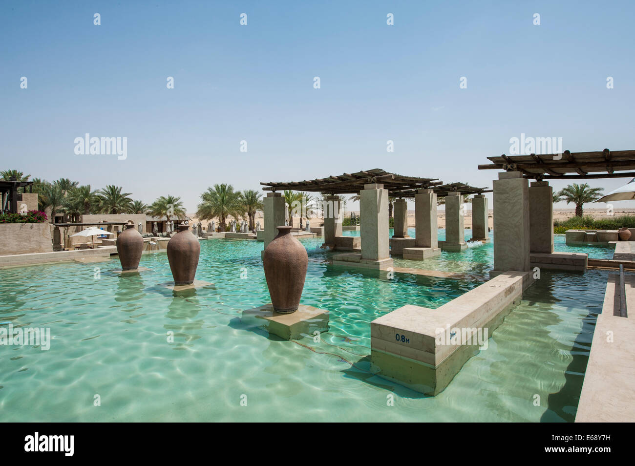 Swimming pool deck vase desert patio area at the Bab Al Shams Desert ...
