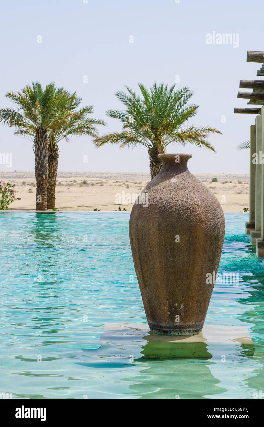 Swimming pool deck vase desert patio area at the Bab Al Shams Desert ...
