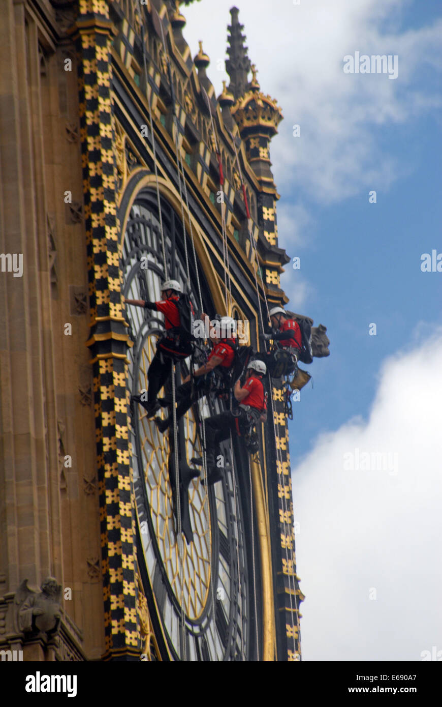 London, UK. 18th Aug, 2014. Time stands still for Big Ben as abseil team clean face. Credit ...