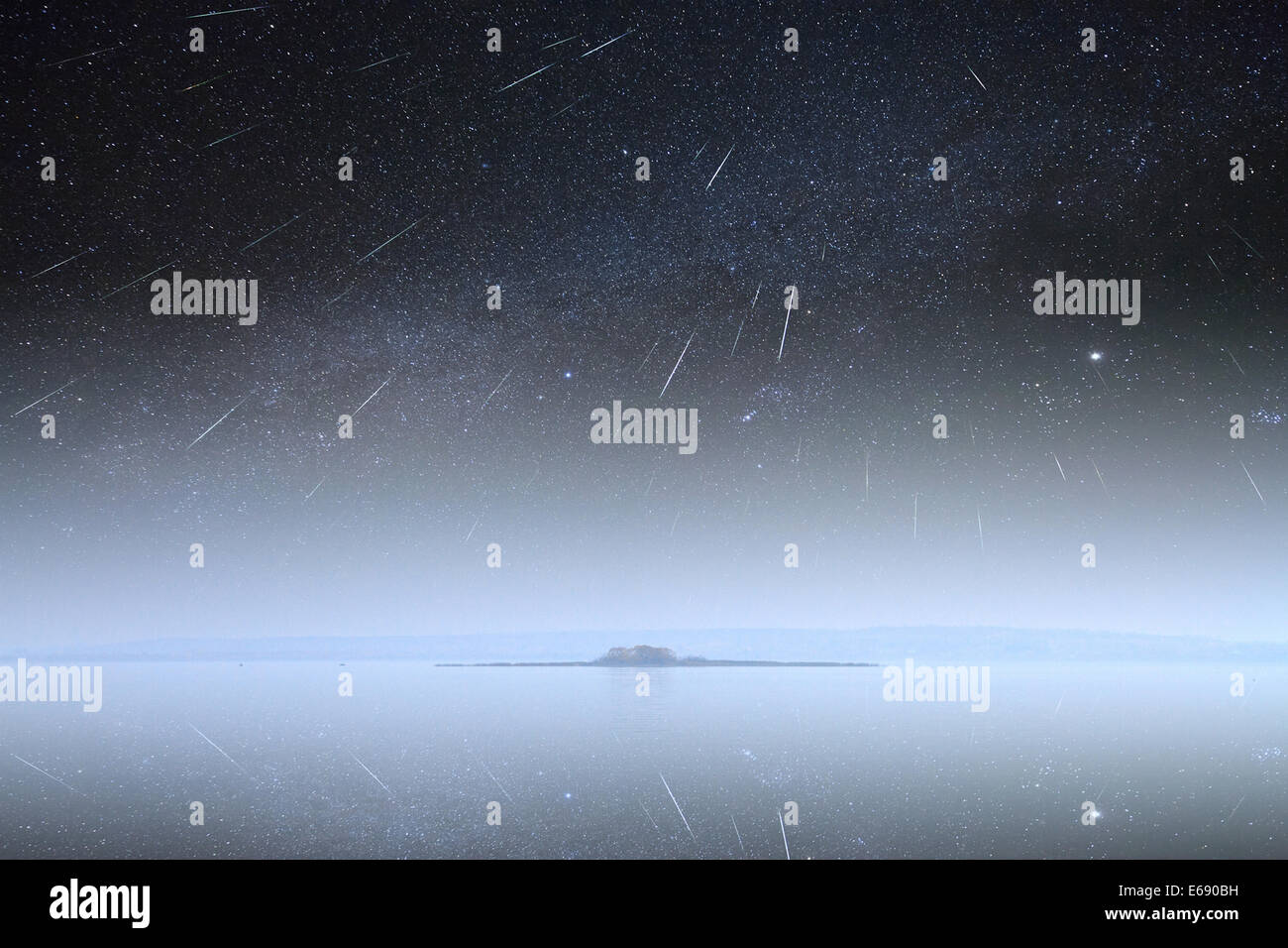 fog over the sea and the island.Elements of this image furnished by ...