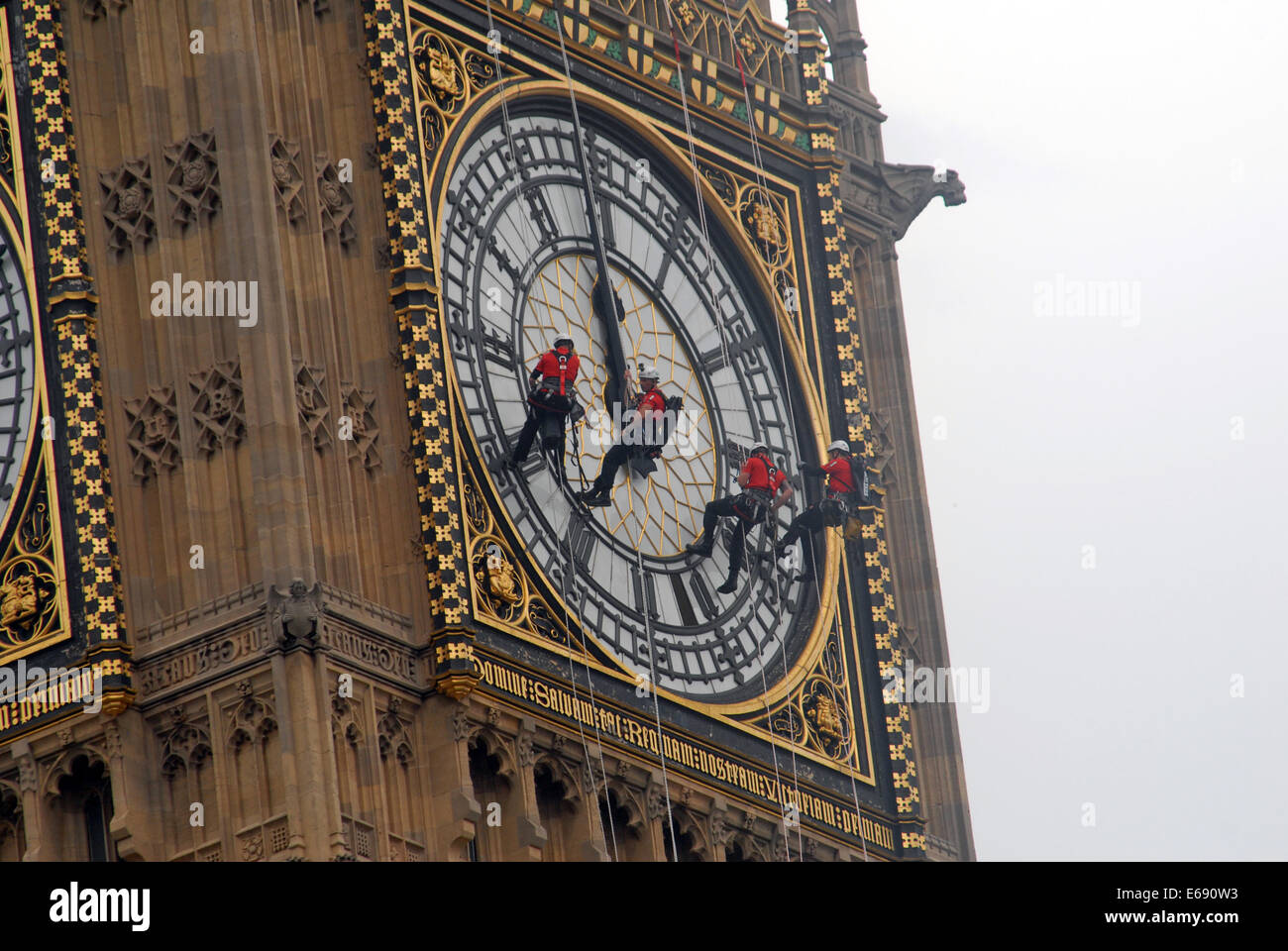 London, UK. 18th Aug, 2014. Time stands still for Big Ben as abseil team clean face. Credit ...
