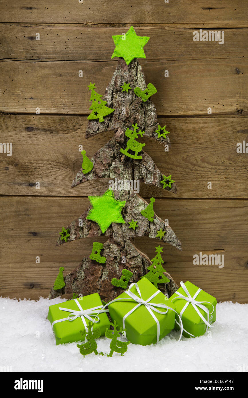 Wooden handmade tree with green gift boxes for christmas Stock Photo ...