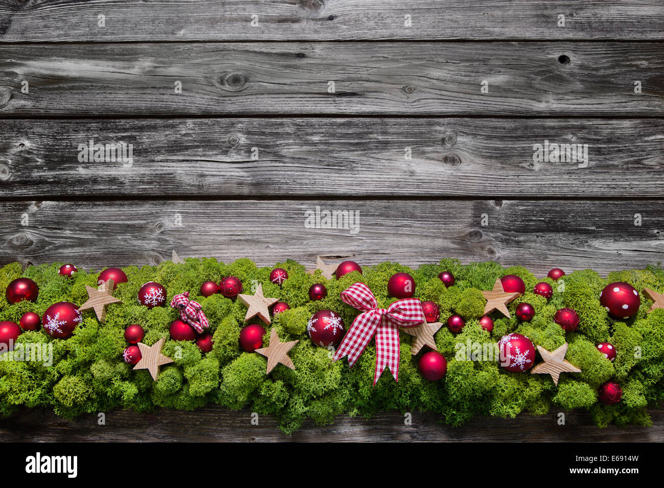 Wooden christmas frame background with green moos and red balls Stock ...