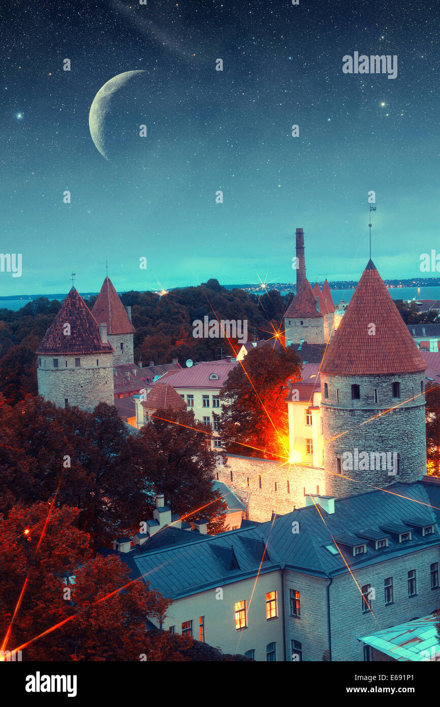 Fabulous medieval city at night. Elements of this image furnished by ...