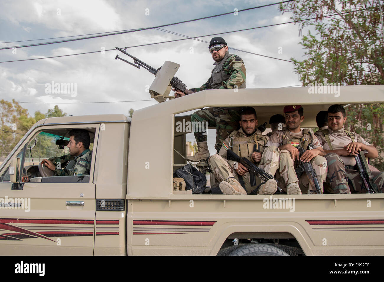 Makhmour, Northern Iraq. 18th Aug, 2014. Peshmerga soldiers leave the ...