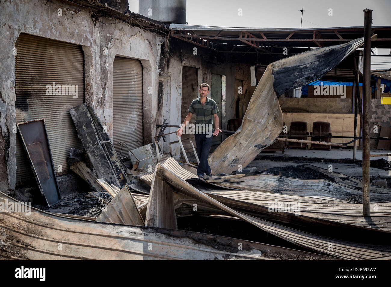Makhmour, Northern Iraq. 18th Aug, 2014. One of the few inhabitants ...