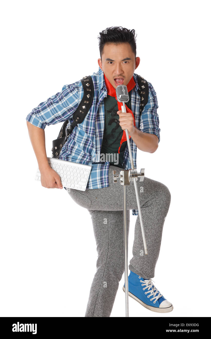 Portrait of young man singing Stock Photo - Alamy