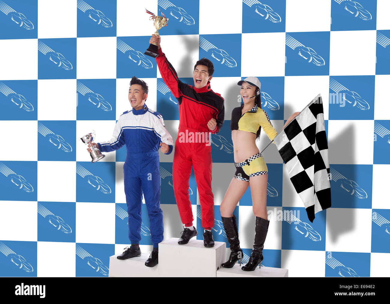 Standing side by side looking away smiling race car driver hi-res stock ...