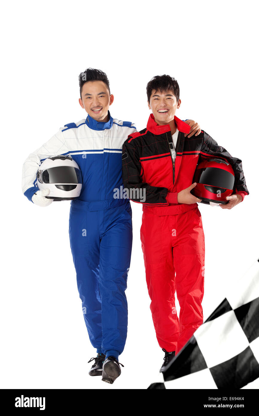 Standing side by side looking at camera race car driver hi-res stock ...