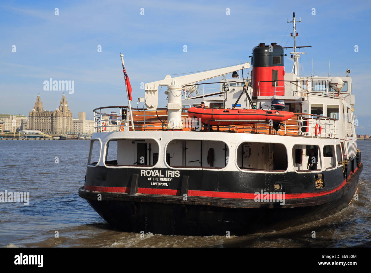 The iconic Mersey Ferry, crossing the river, in Liverpool, on ...