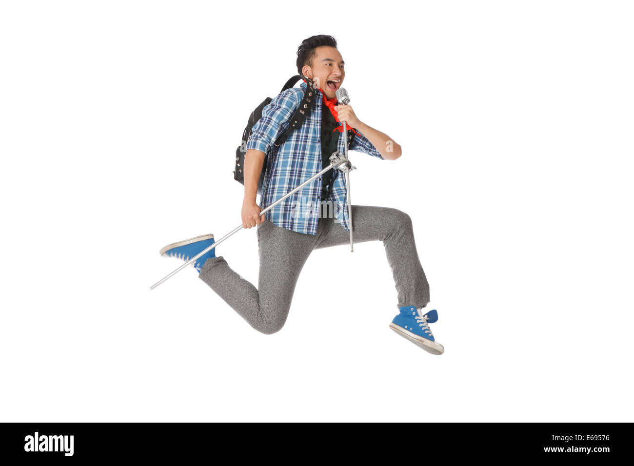 Portrait of young man singing Stock Photo - Alamy