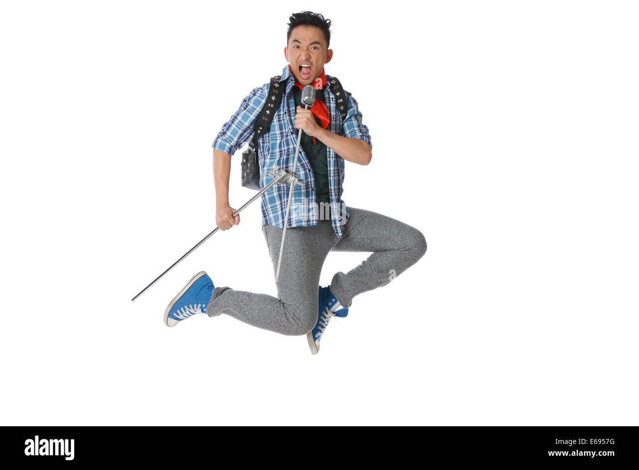 Portrait of young man singing Stock Photo - Alamy